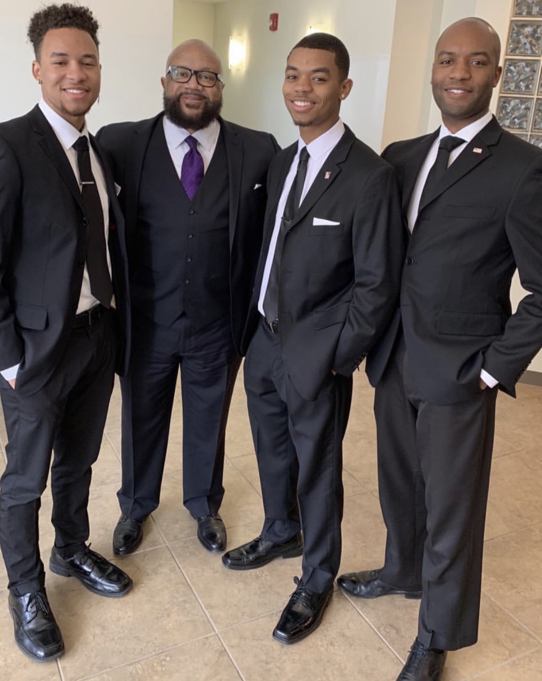 Zachary, Bishop Donald Hilliard Jr., Logan & Christopher Bell